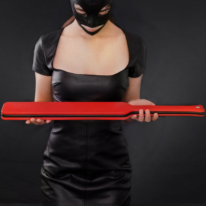 BDSM paddles, leather slappers and spanking straps by EspressivoClub